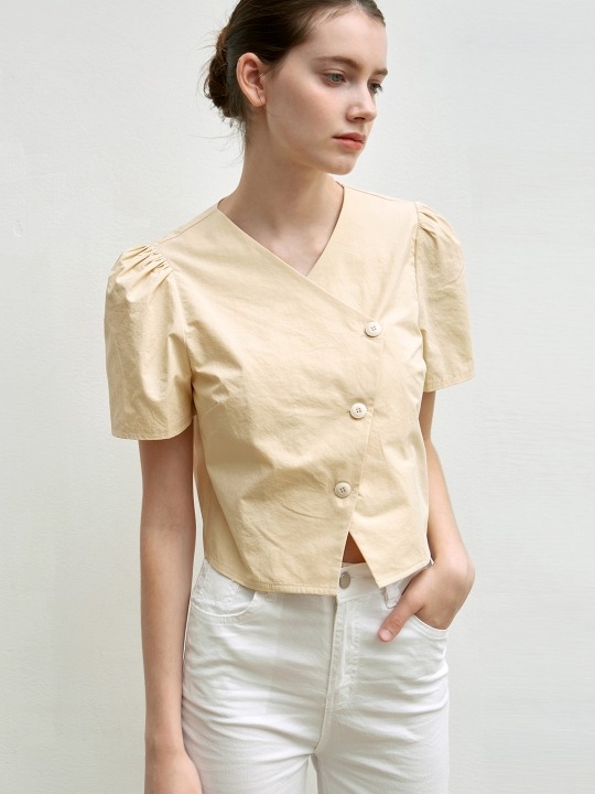 DIAGONAL BUTTON BLOUSE_YELLOW - HAGO(하고)