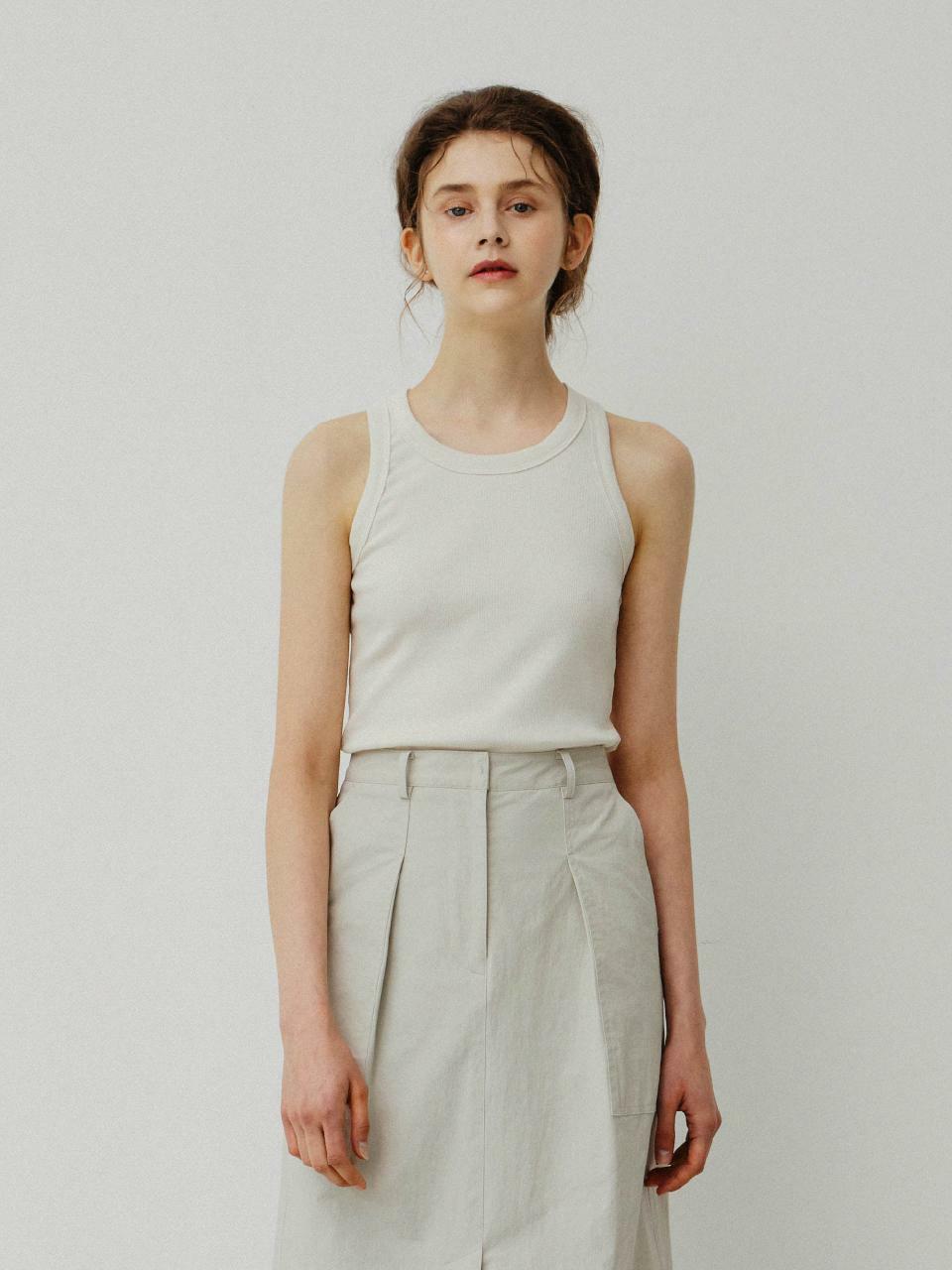CREAM ELODIE RIBBED SLEEVELESS TOP - 하고